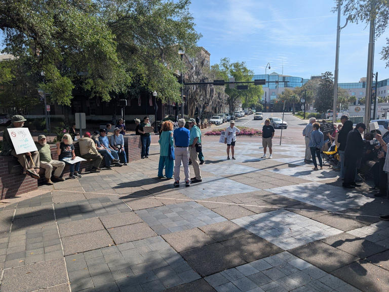 Tallahassee seniors protest outside Congressman Neal Dunn’s office over ...