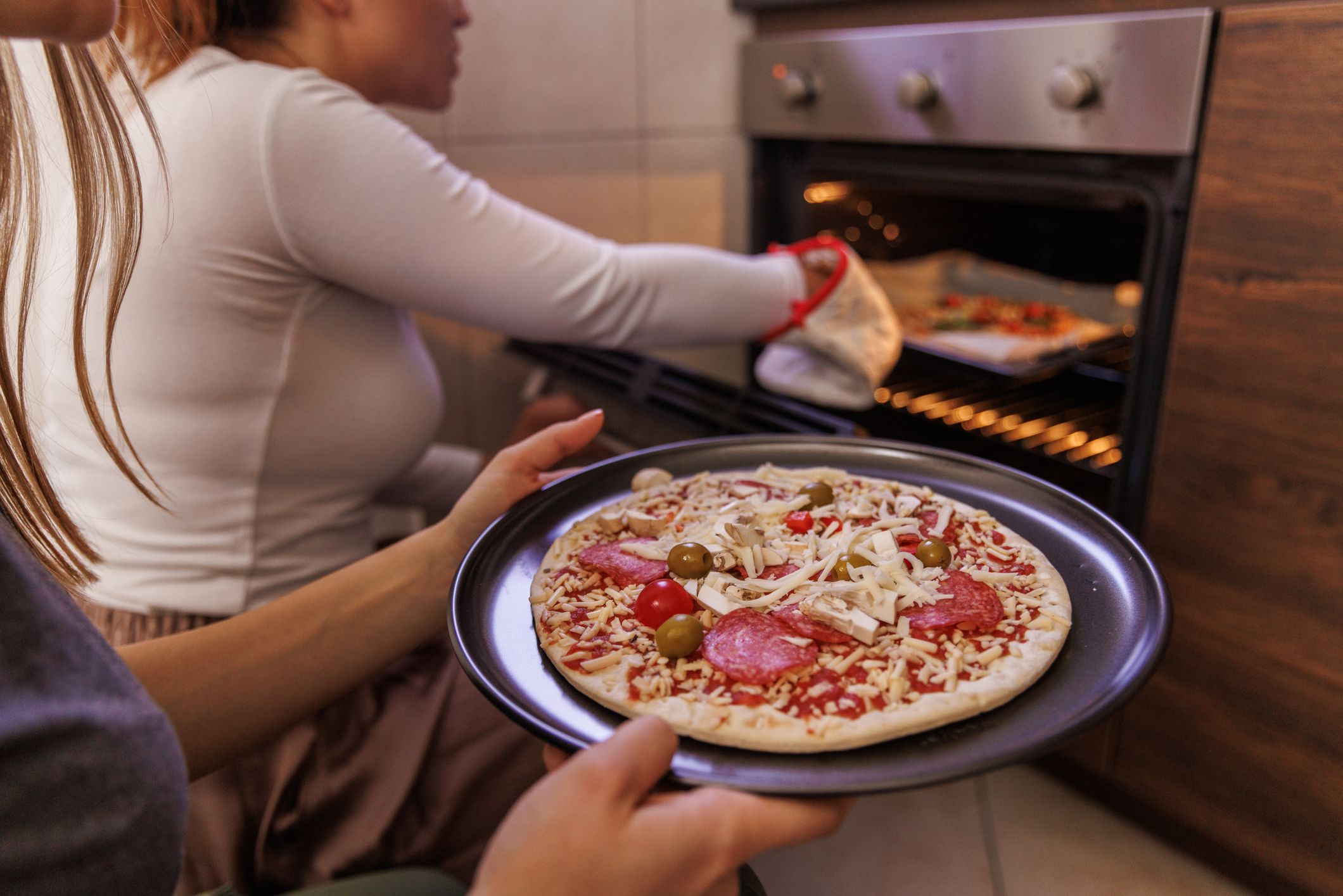 13 Clever Hacks to Make Frozen Pizza Taste Better