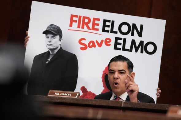 Elon goes for Elmo as DOGE hearing breaks into hysterics over puppet's ...