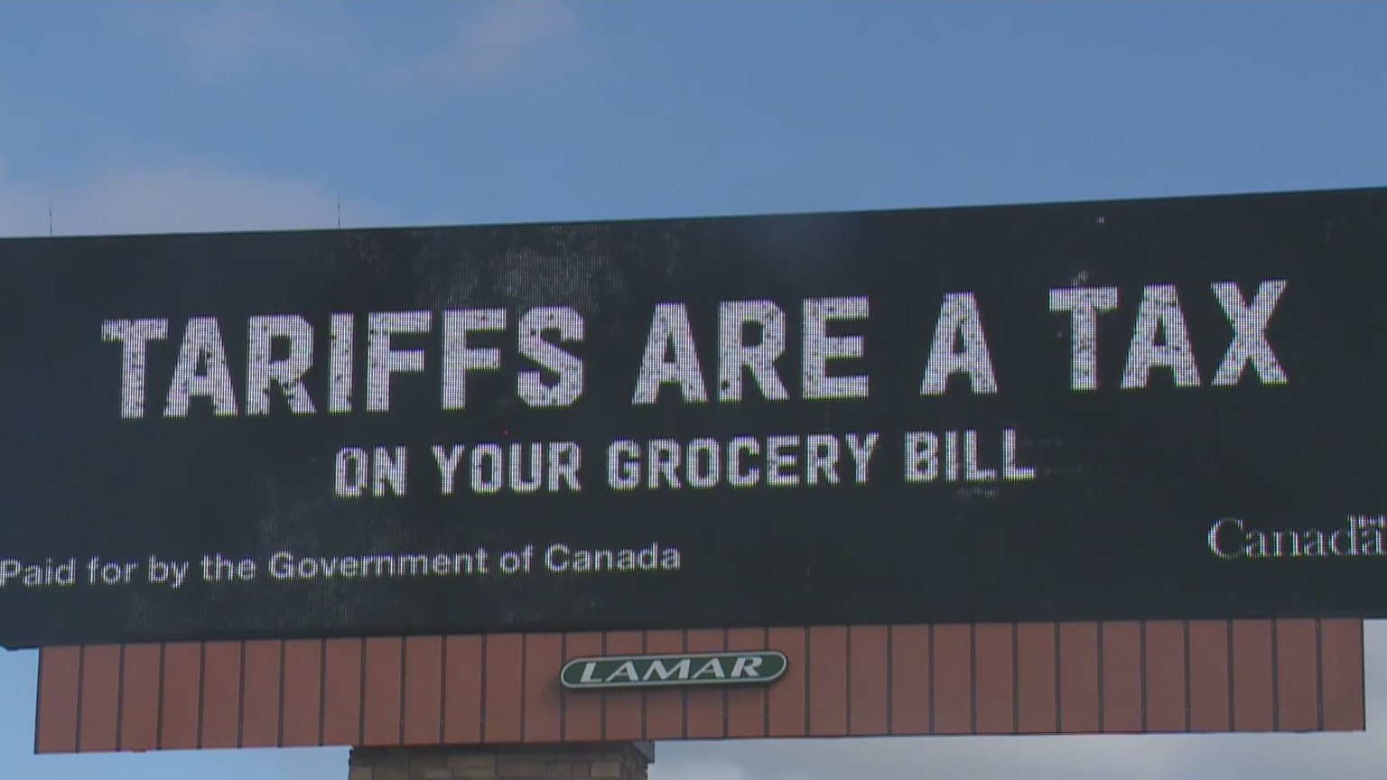 Anti-tariff billboards popping up in Metro Detroit