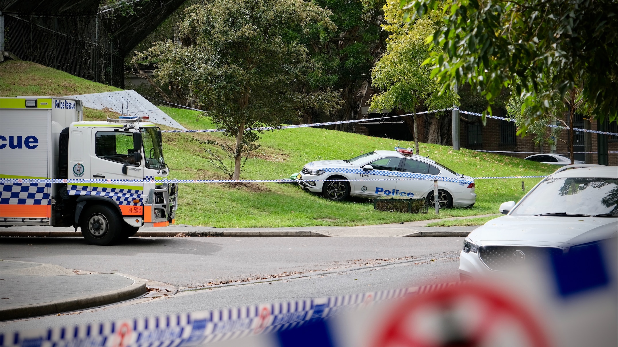 Man dead after police car collides with e-bike in Sydney's Waterloo