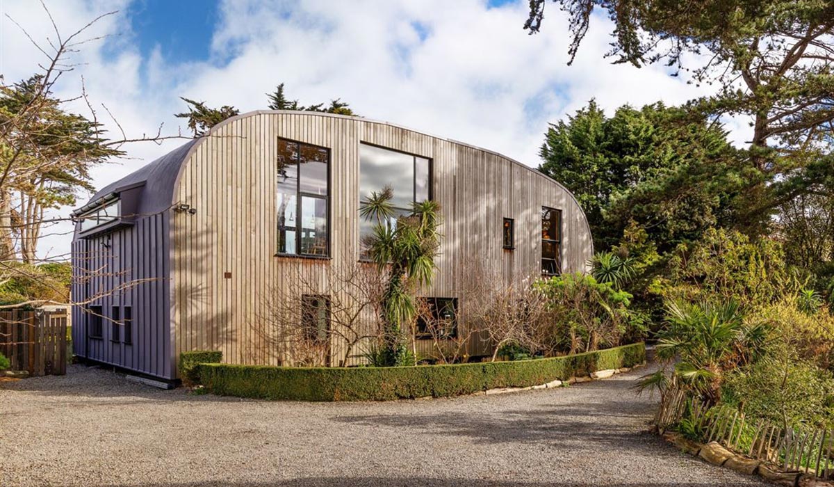 Unique timber-clad home that overlooks Howth beach on the market for € ...