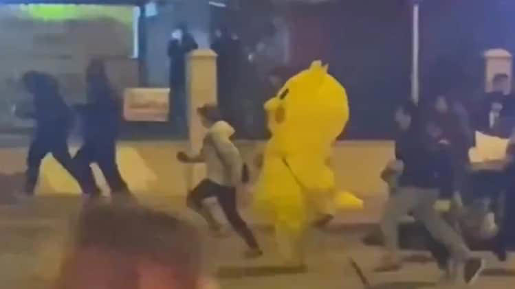 WATCH- Pikachu vs police: Protester in Pikachu costume seen running ...
