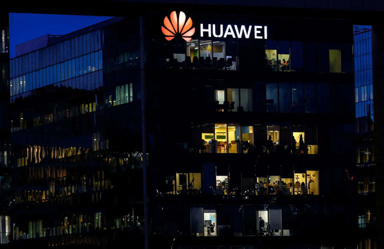 After years of survival, China's Huawei returns to revenue peak
