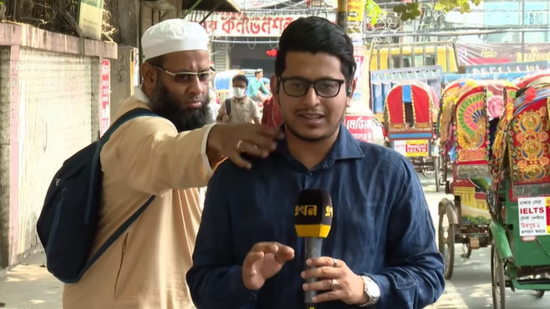 Bangladeshi journalist's collar gets fixed by a stranger on live TV ...