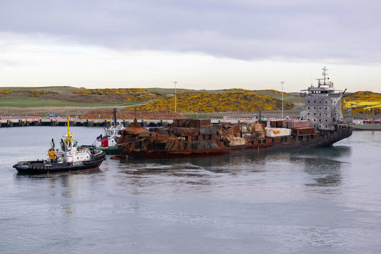 10 striking images as container ship Solong towed into Scottish port ...