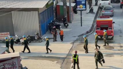 Rescuers at site of building that collapsed in Thai capital during ...