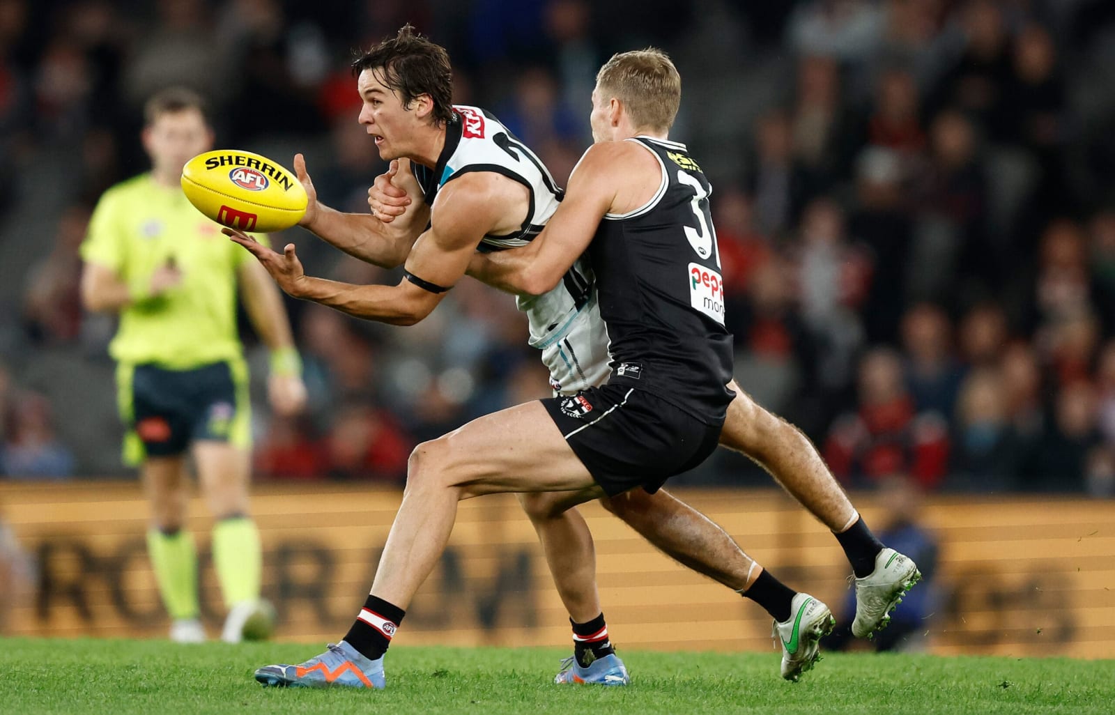 AFL MRO: Power captain among trio charged