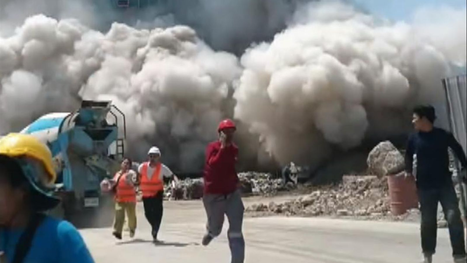 Moment building collapses in earthquake