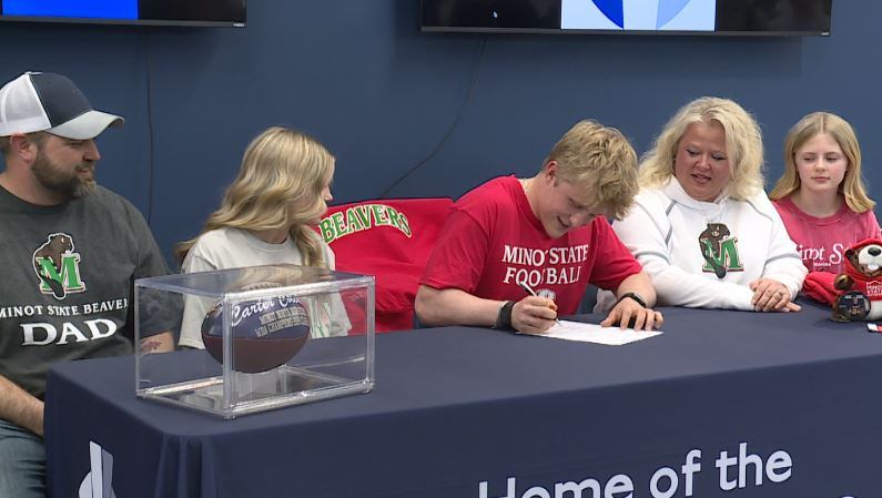 Minot North football’s Carter Coleman signs with Minot State