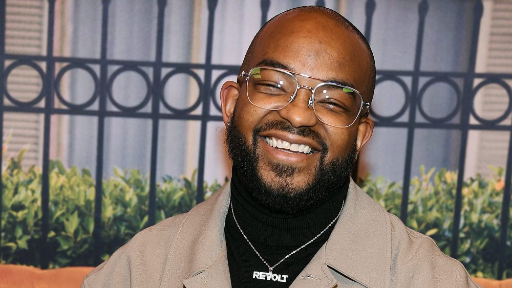 Revolt's Detavio Samuels, Black Star Network Leader Roland Martin and BET Founder Robert Johnson ...