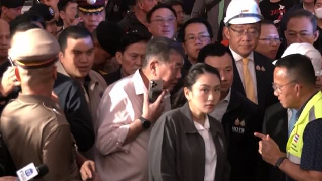 Thai PM visits collapsed skyscraper in in Bangkok