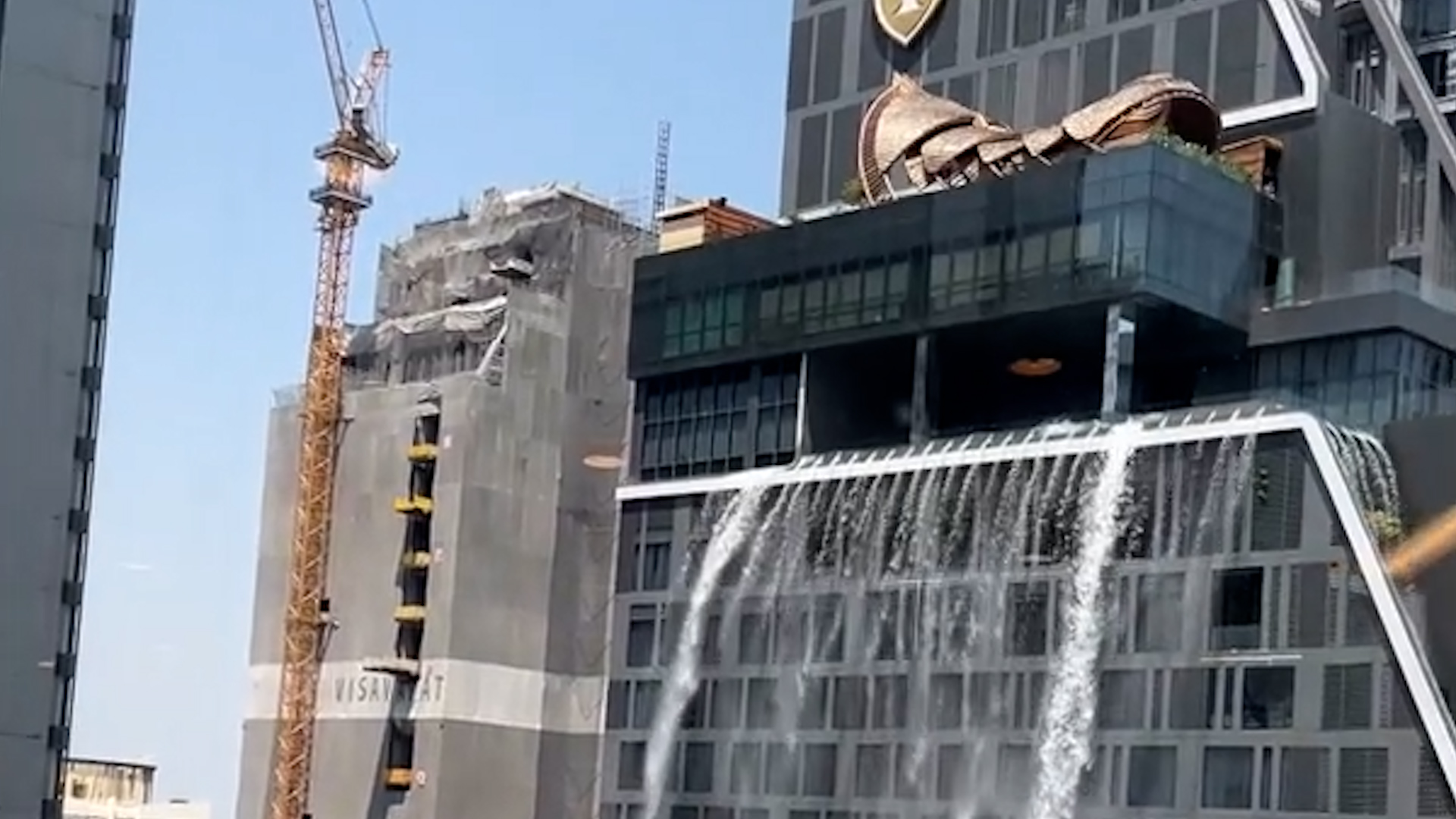 Bangkok earthquake shakes buildings as water cascades from rooftop