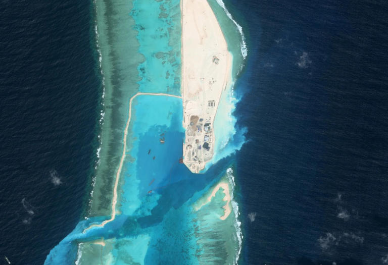 Satellite Photos Show Island Building in Contested South China Sea