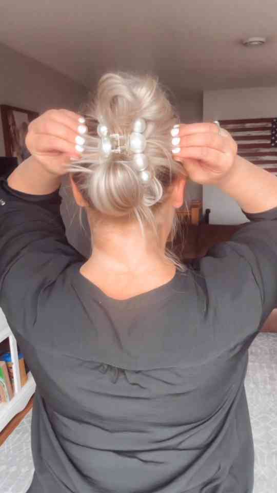 Effortless Hair Bun Tutorial with a Stylish Twist