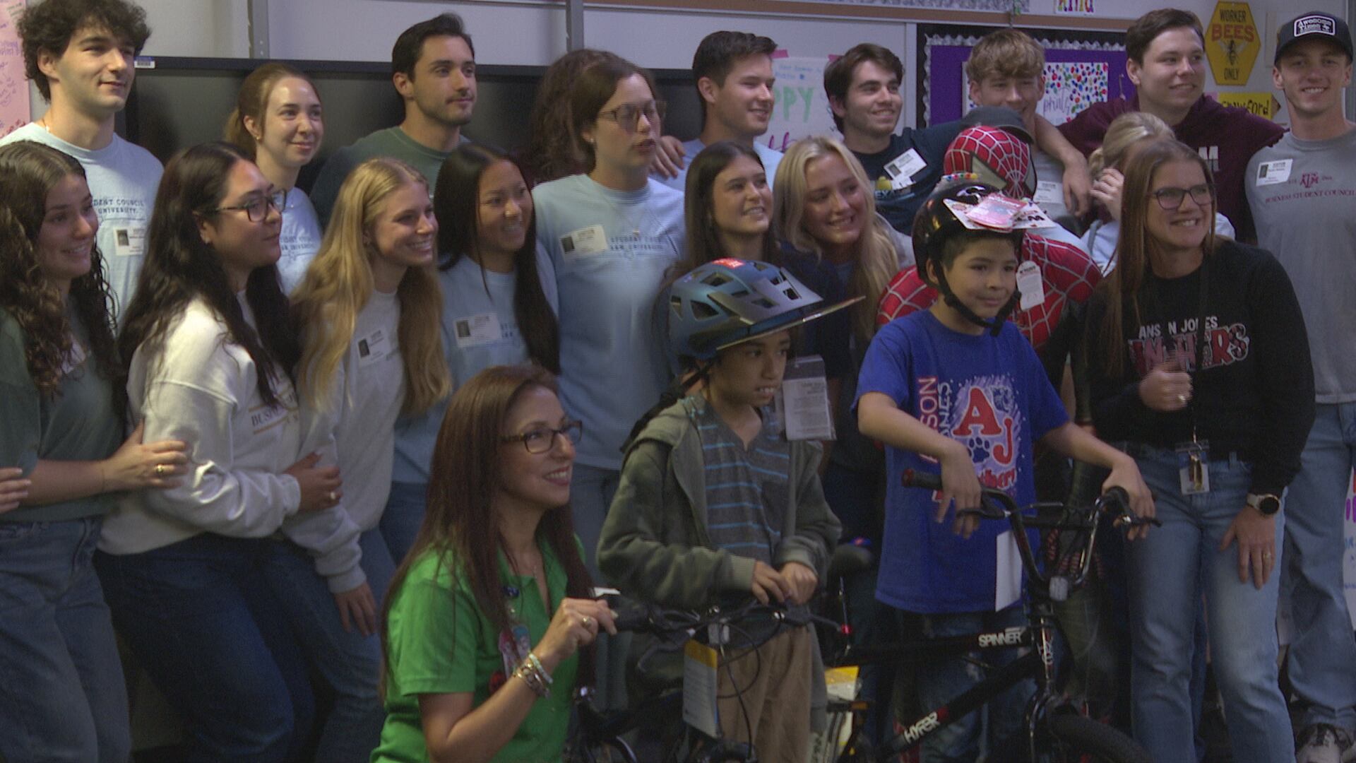 Mays Business School gifts 2 Bryan elementary students with new bikes