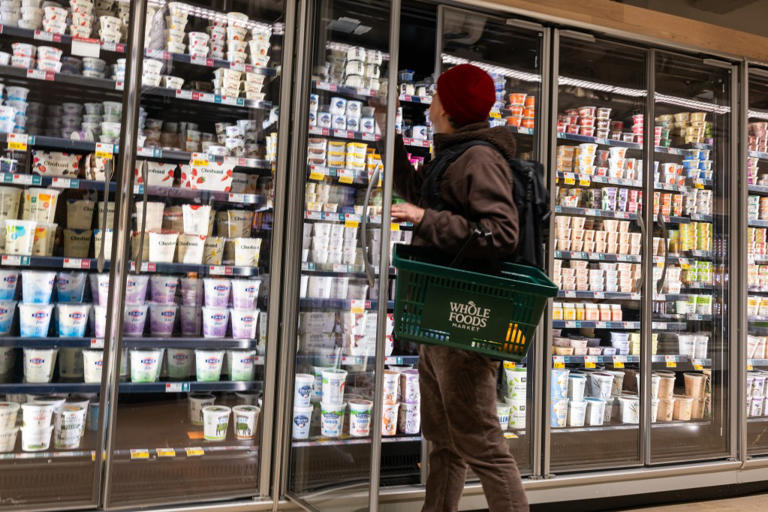 Dow tumbles over 700 points on inflation worries, Trump tariffs