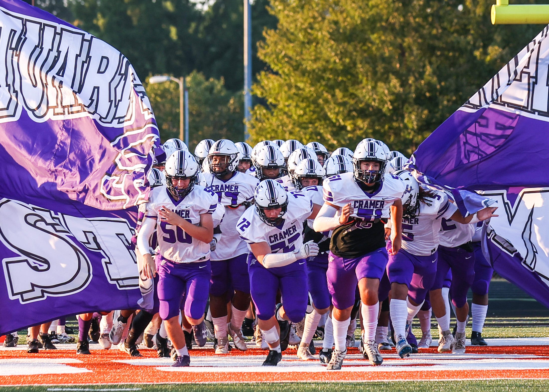 Stuart Cramer football standout announces college plans. Where's he headed?