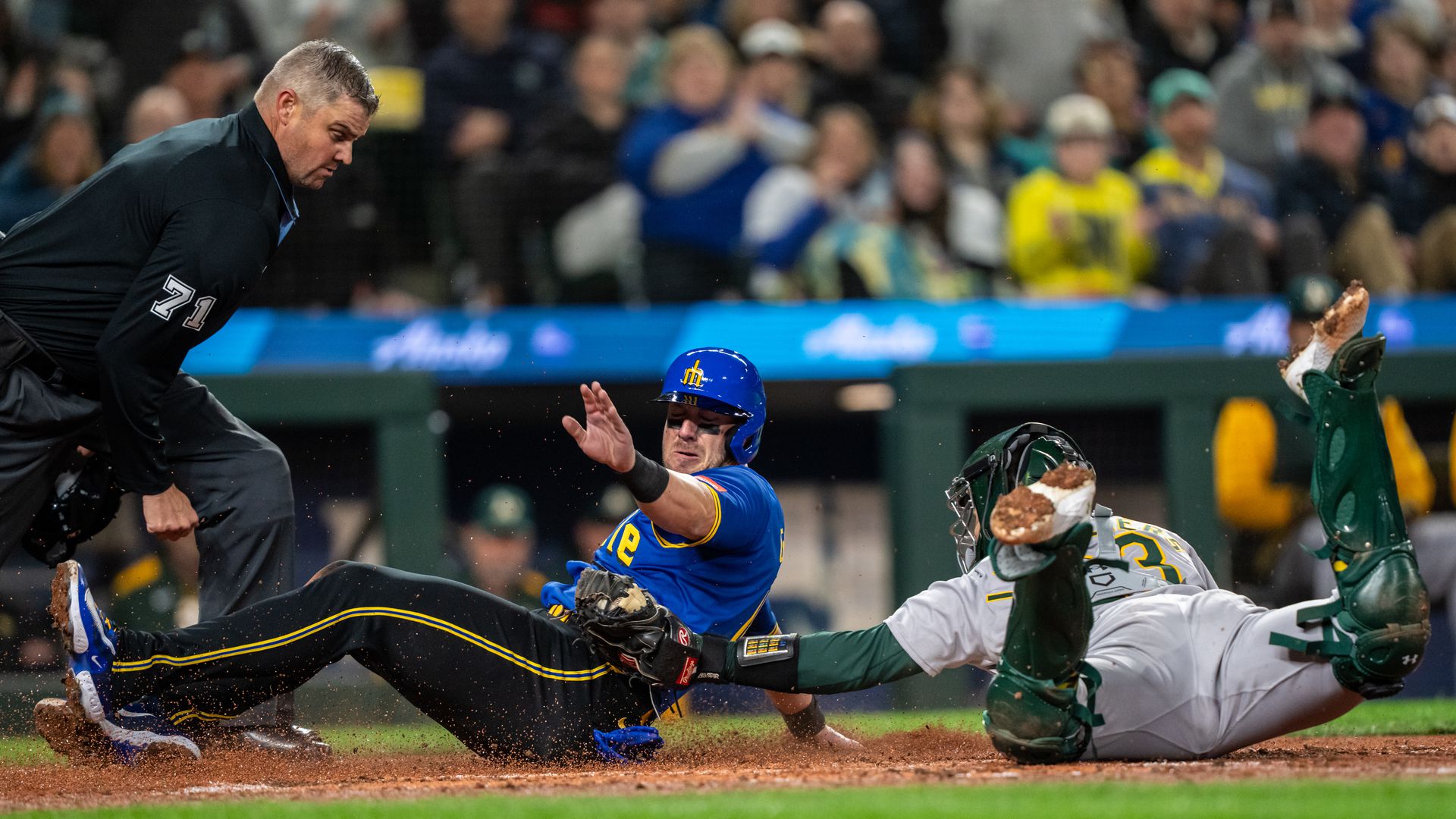 Tagged out at home, for home runs, Mariners lose 7-0