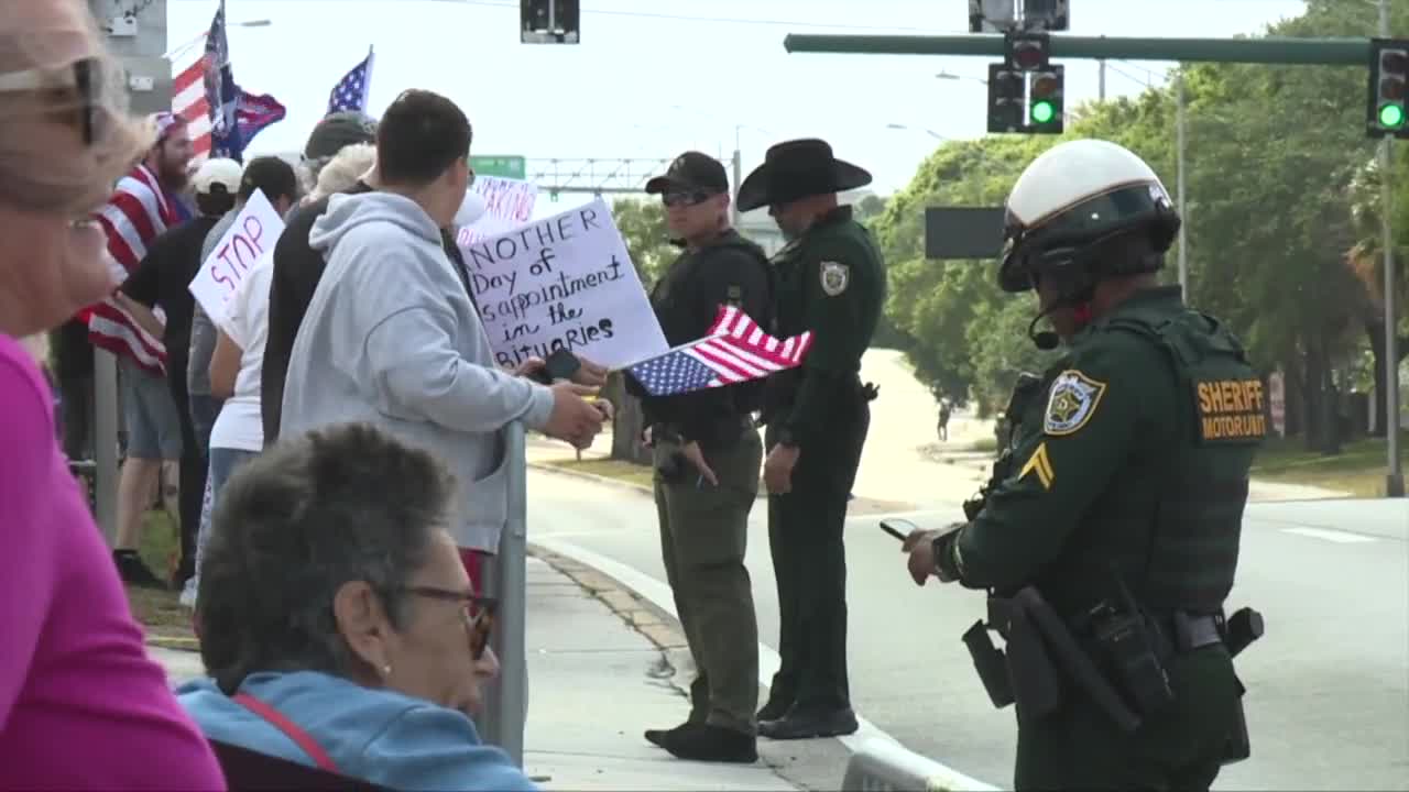 Protesters, supporters line the streets for President Trump's return to ...