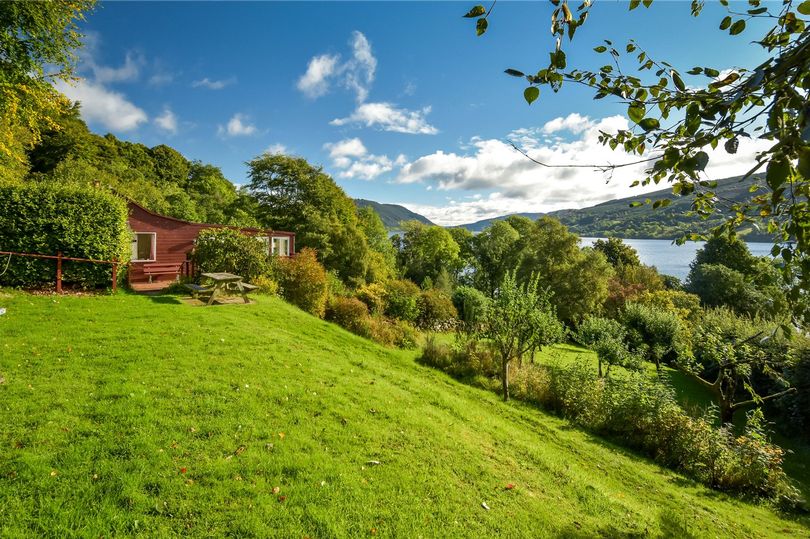 Inside Scottish former bothy with idyllic loch views and its own beach ...
