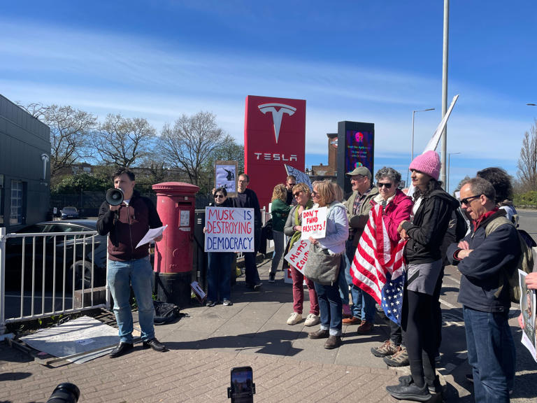 Tesla Takedown protests LIVE: Demonstrators rally outside London Tesla ...