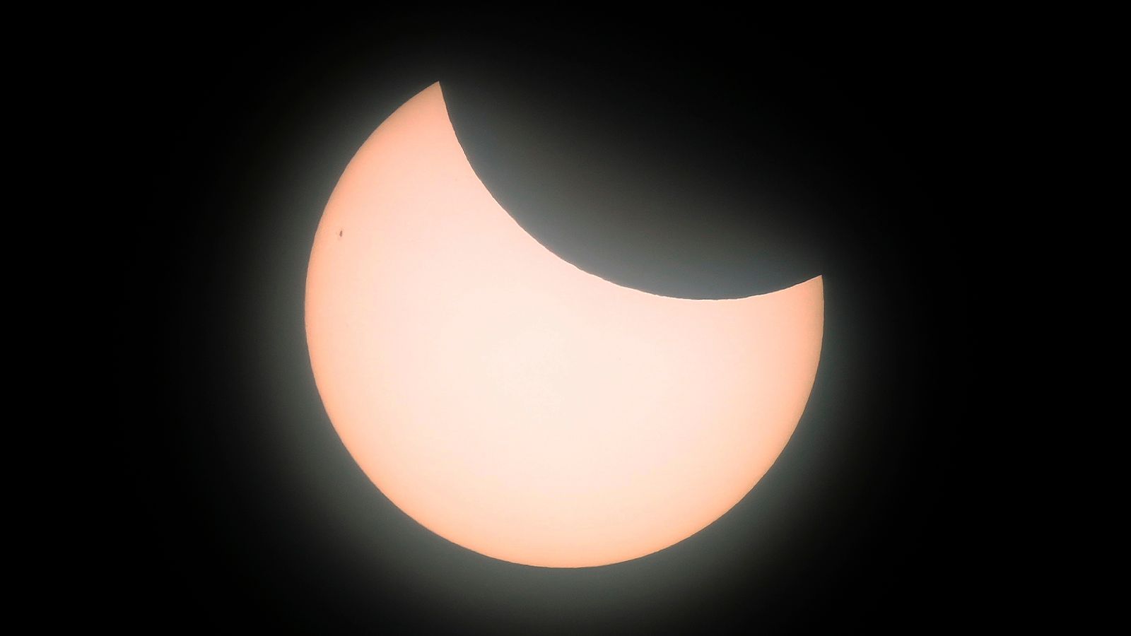 'Experiencing the solar system for yourself': Sun obscured over the UK in partial solar eclipse
