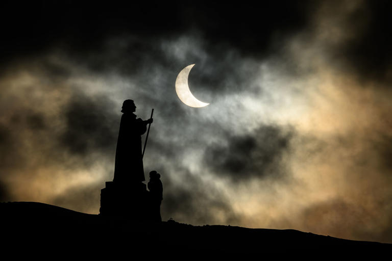 Solar eclipse: Photos of today's rare "double sunrise" eclipse