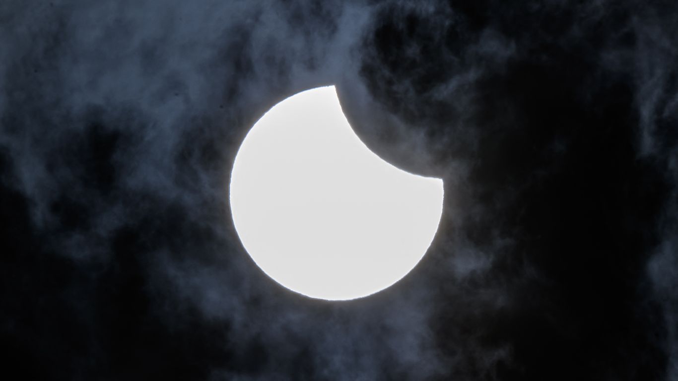 Solar eclipse: Photos of today's rare "double sunrise" eclipse