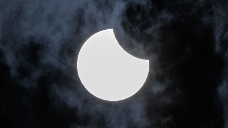 Solar eclipse: Photos of today's rare "double sunrise" eclipse