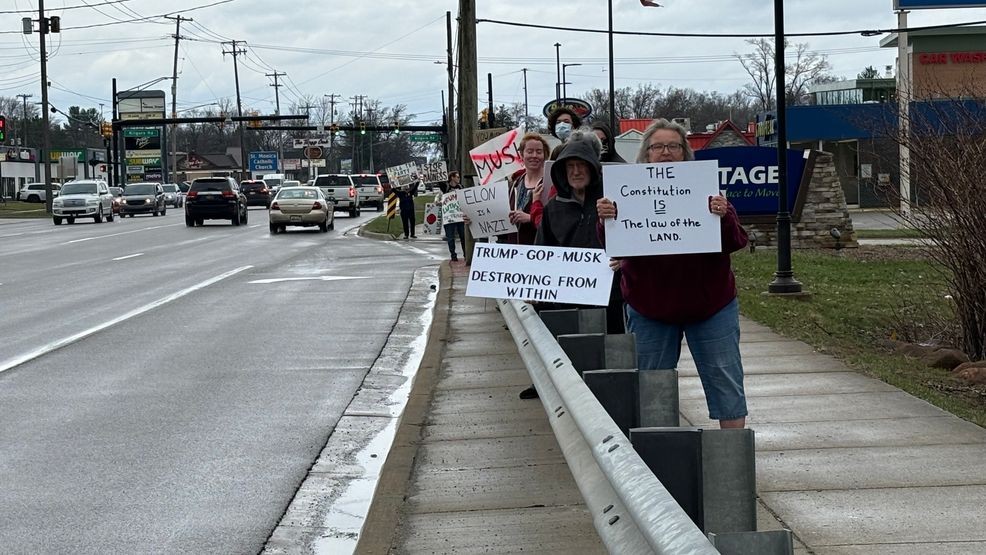 Kalamazoo, Grand Rapids join nationwide 'Tesla Takedown' protests