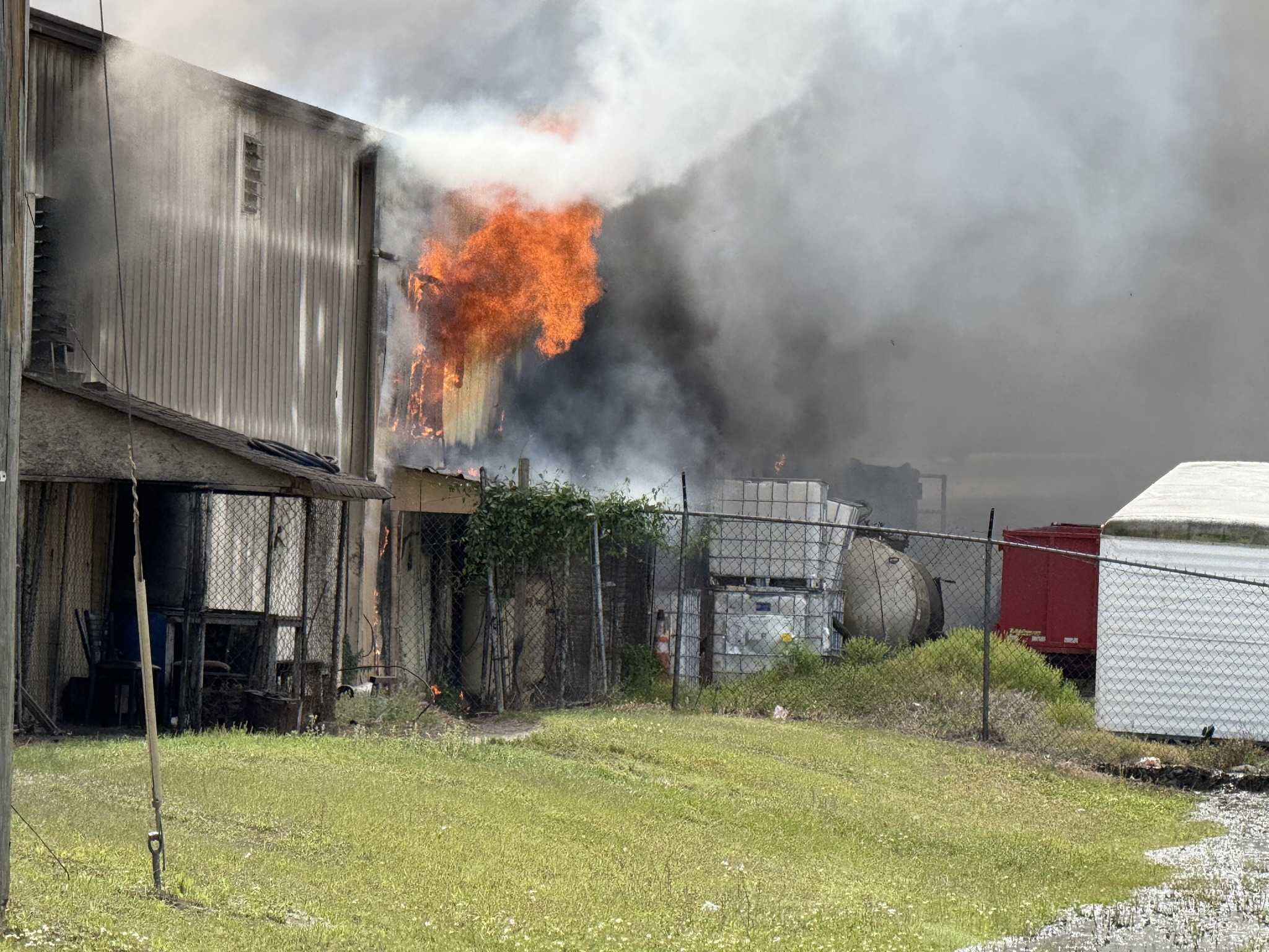 Firefighters extinguish large warehouse fire in Osceola County