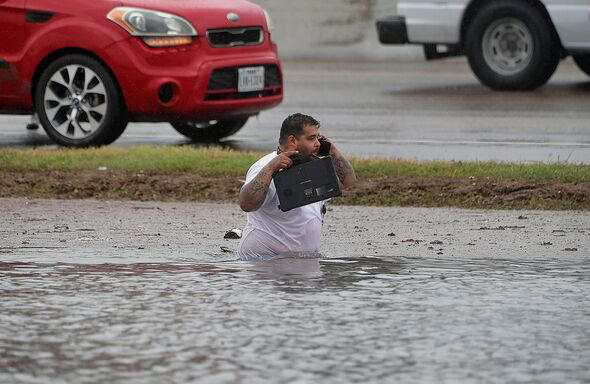 Texas flooding: Terrifying images show cars underwater as four dead in ...