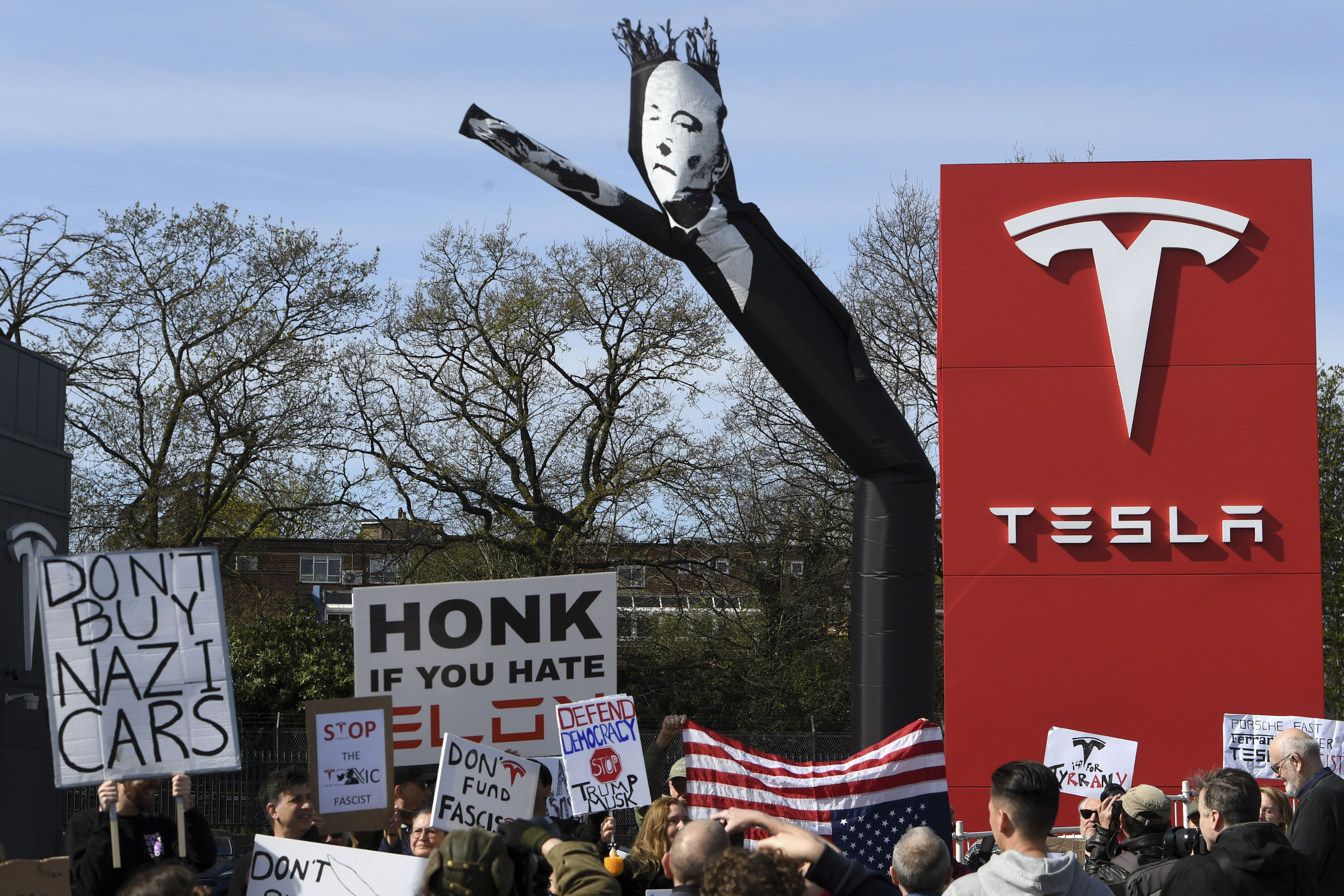 Tesla Takedown protests LIVE: Demonstrators rally outside London Tesla ...