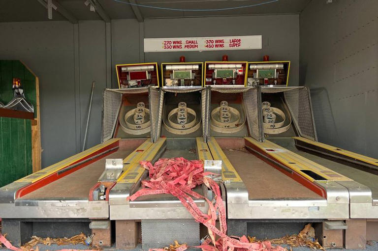 Inside eerie abandoned theme park with rotting piles of tickets and ...