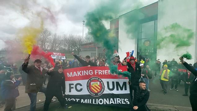 Man United and FC United fans shout 'Glazers out' during protest
