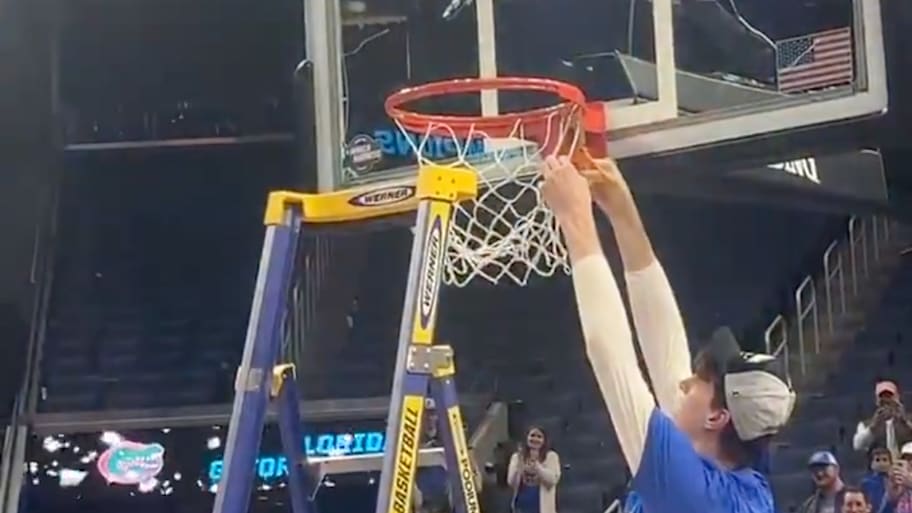 Florida's 7'9" Center Got to Show Off His Incredible Net-Cutting Trick ...