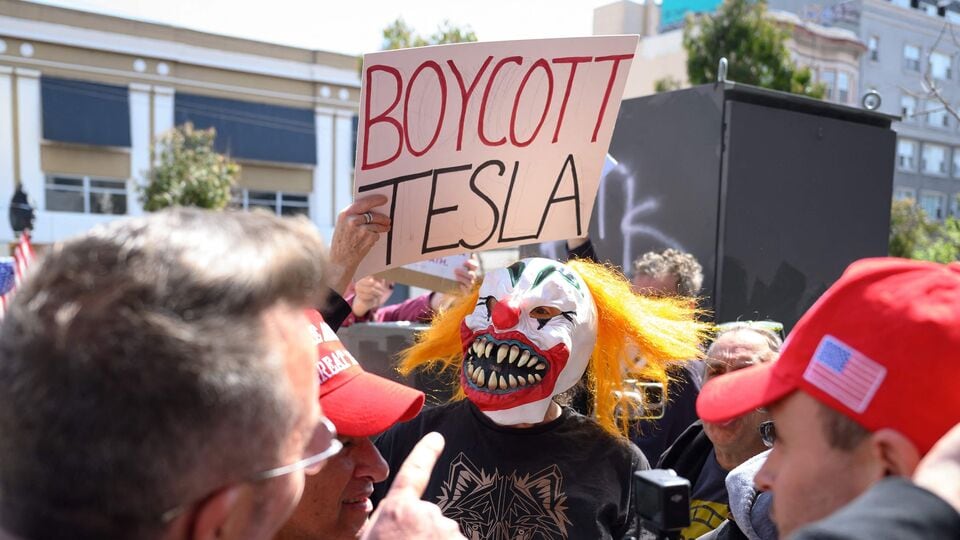 Tesla takedown: Activists display Nazi posters as protests intensify ...