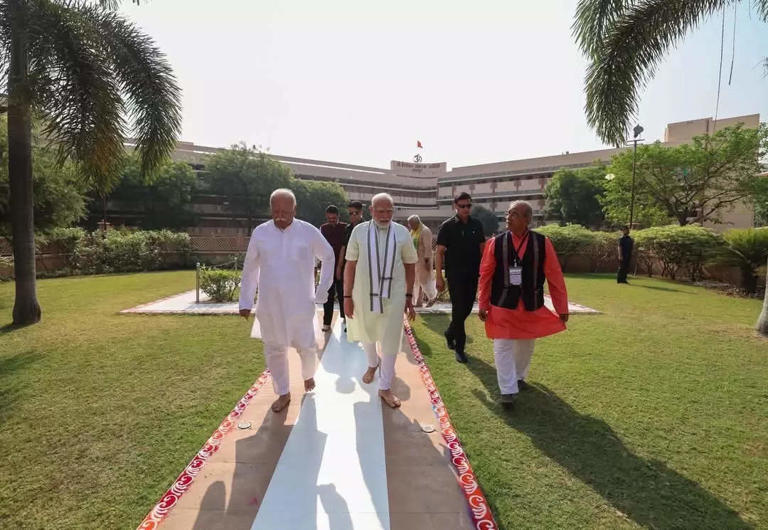 PM Narendra Modi praises RSS for its role in nation-building with Sangh chief Mohan Bhagwat by ...