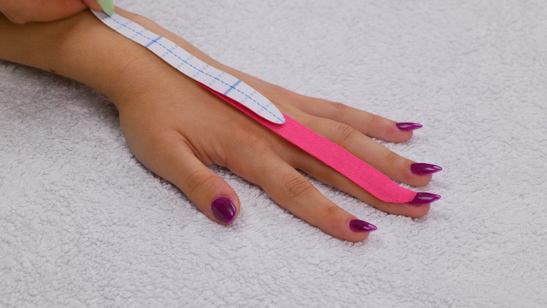 Master Kinesiology Tape With Precision