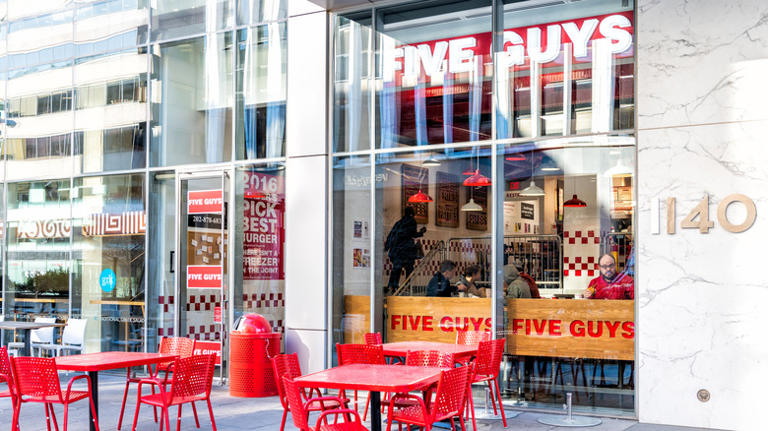 Which Famous Golfer Owns A Slew Of Five Guys Restaurants?