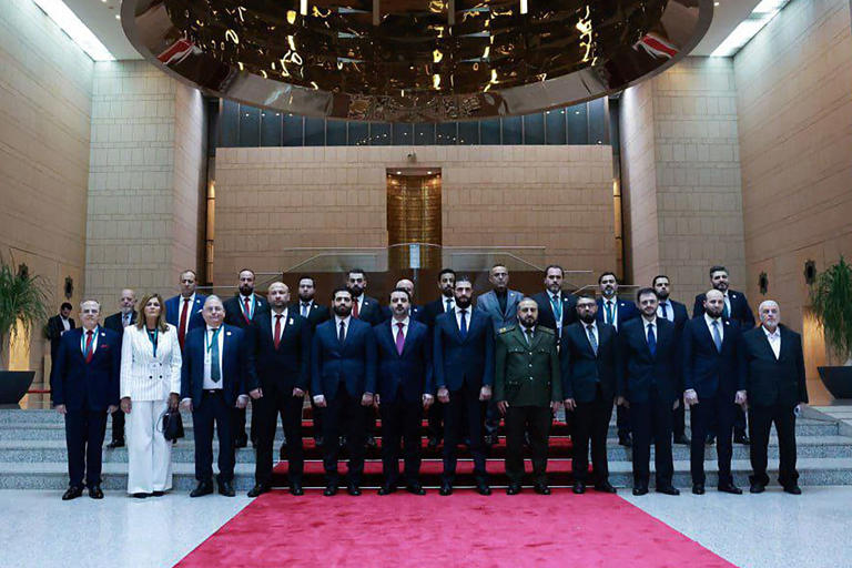 Who are the key ministers in Syria's new transitional government?