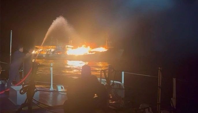 Coast Guard rescues 12 crewmen from burning vessel