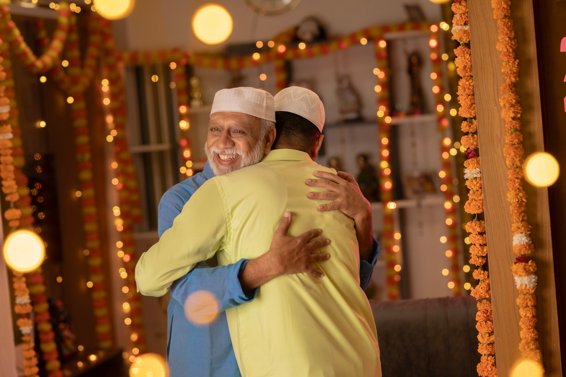 What does Eid Mubarak mean and how should you reply to the greeting?