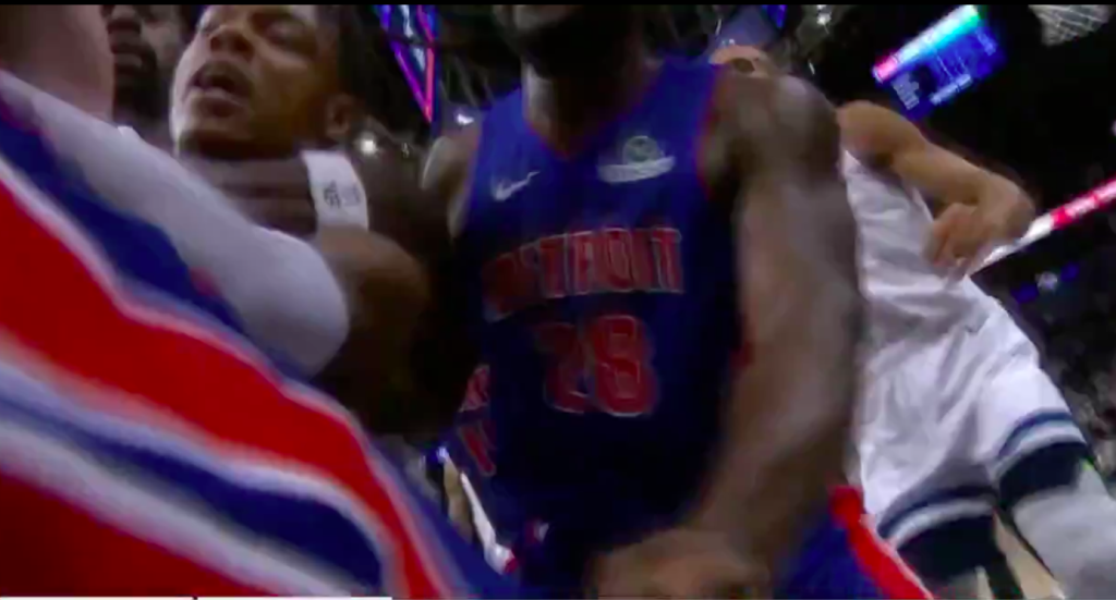 Cameraman caught in middle of NBA brawl