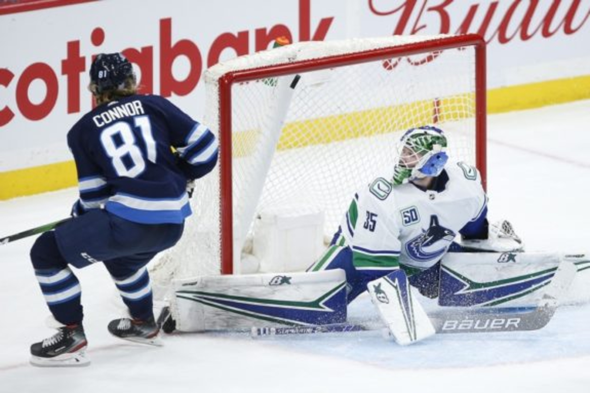 Jets Stretch Lead in Central With 3-1 Win Over Canucks
