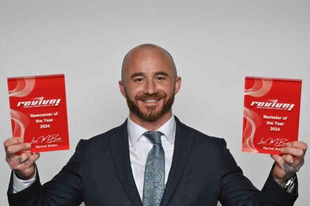 Bolton business owner wins 2 awards in recognition of his hard work