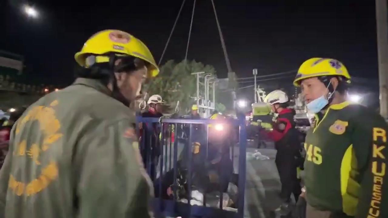 Rescue teams search rubble of earthquake toppled building in Bangkok