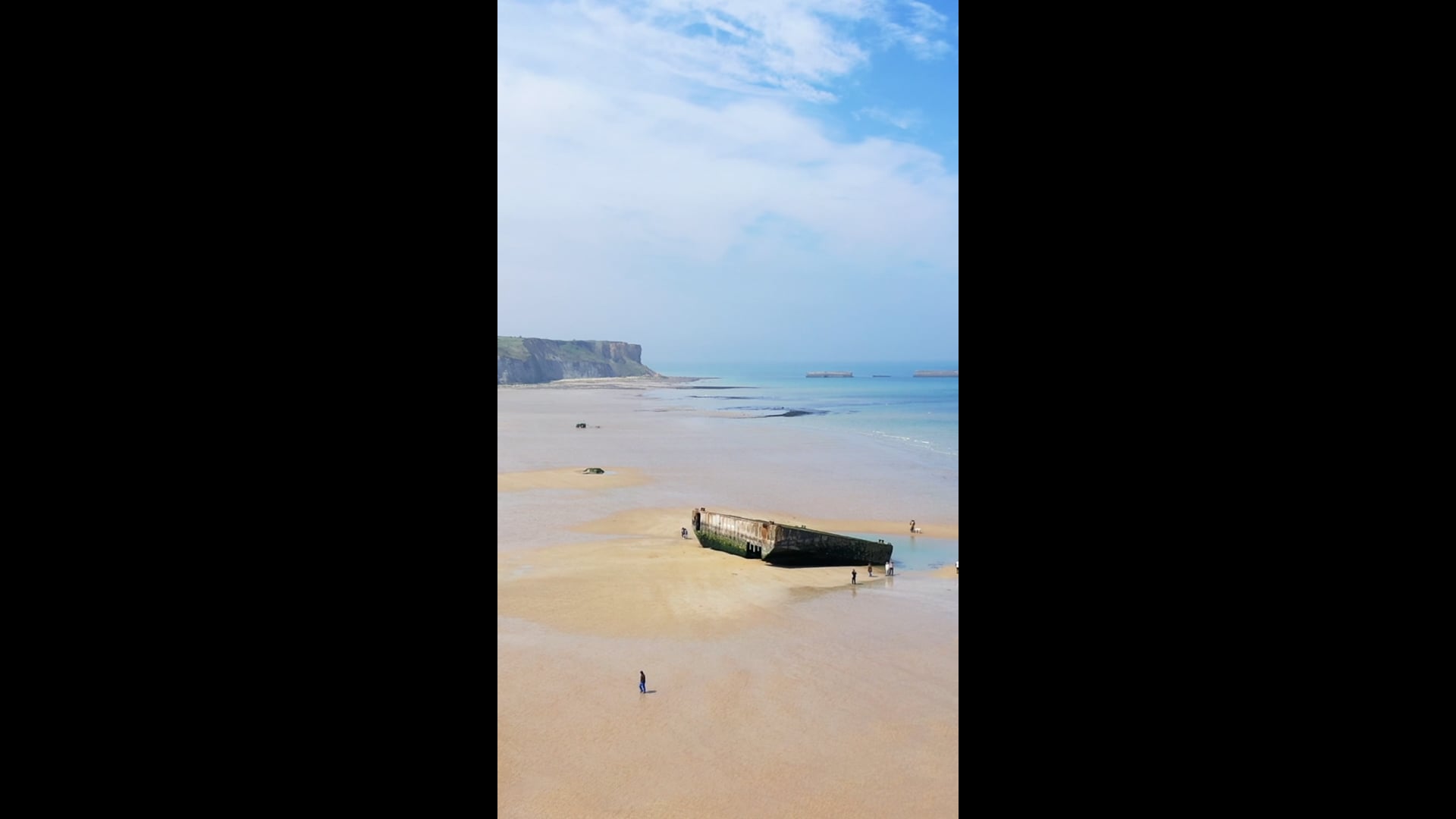 D-Day Unveiled: Drone Views of Normandy's WWII Beaches.