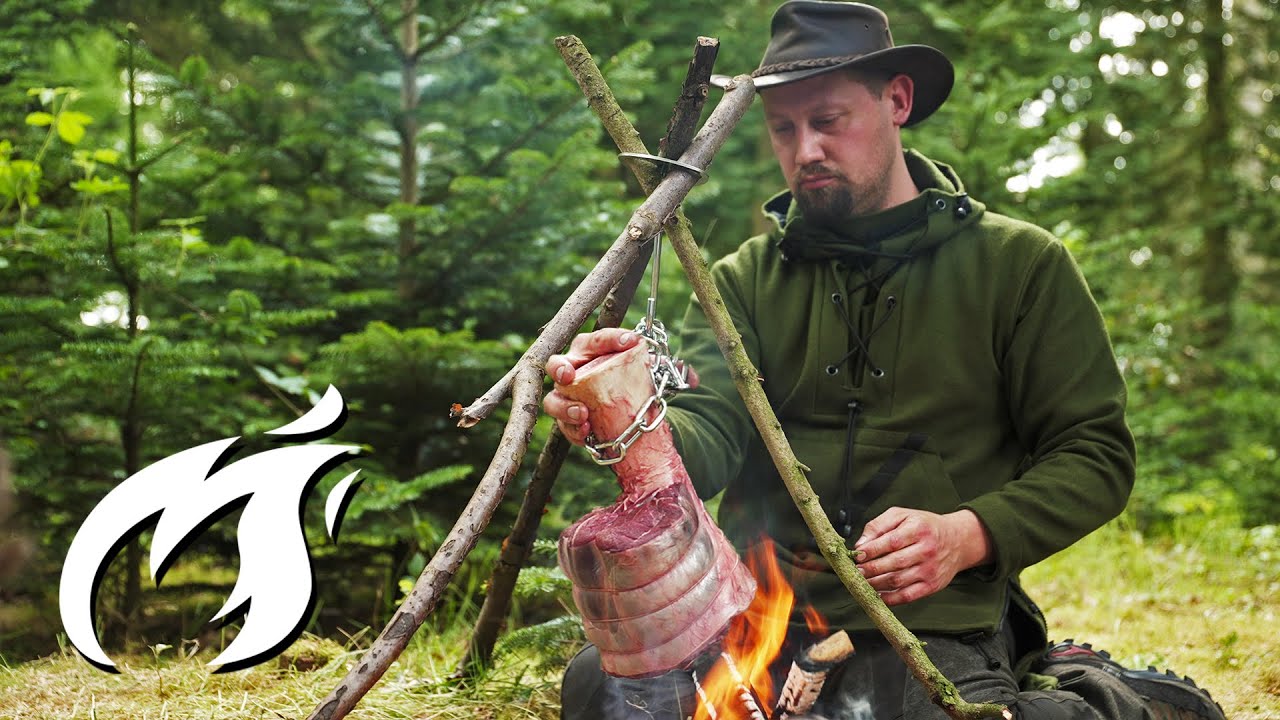 Giant Beefhammer Grilled Over Fire on a Chain